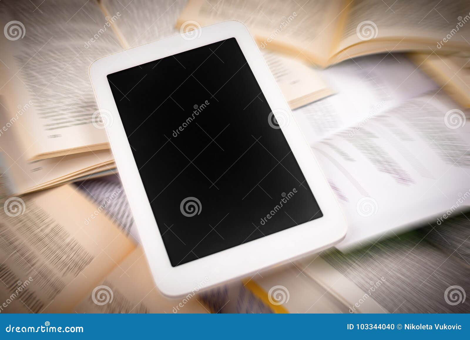 Digital tablet on books stock photo. Image of educational - 103344040