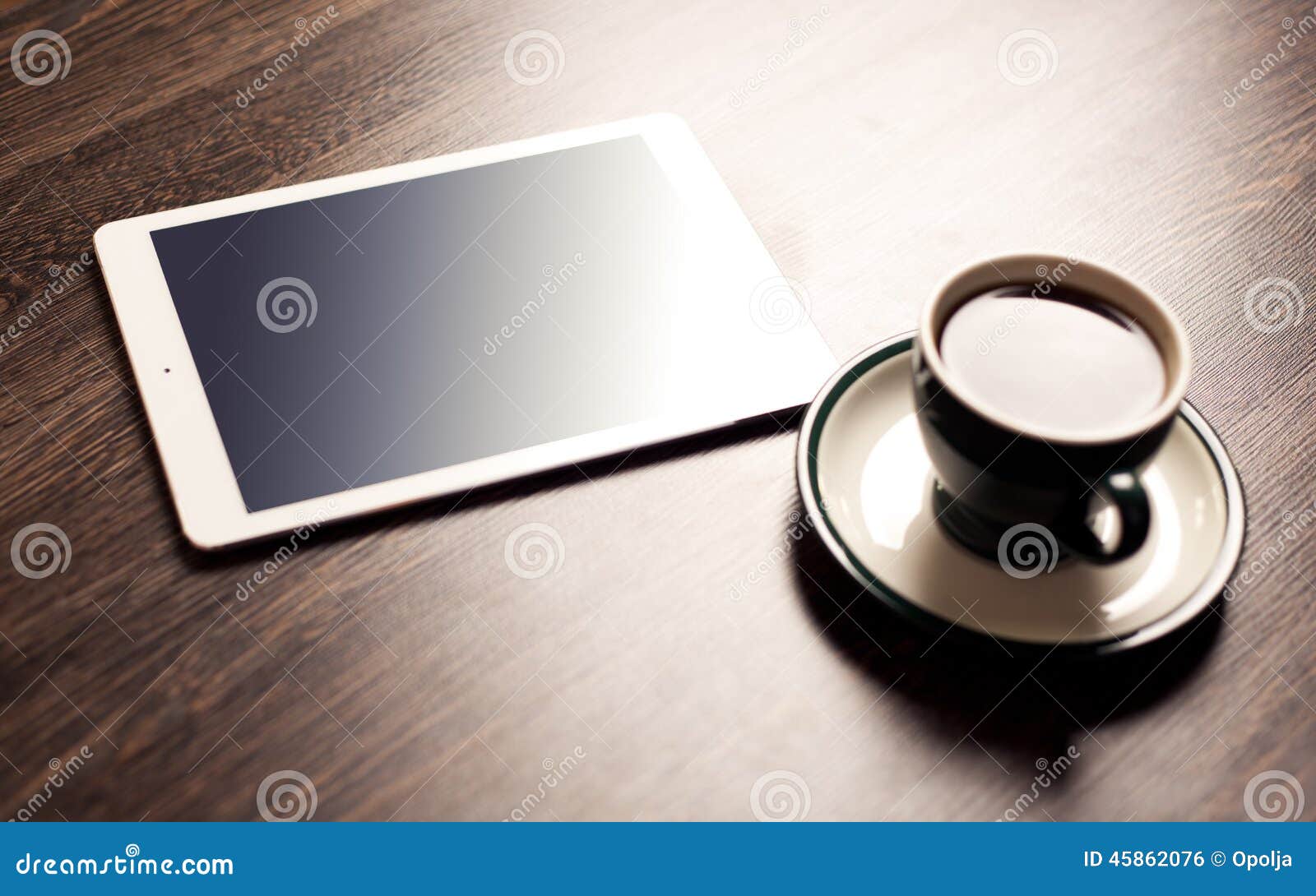 Digital Tablet Computer with Cup of Coffee on Old Wooden Desk Stock ...