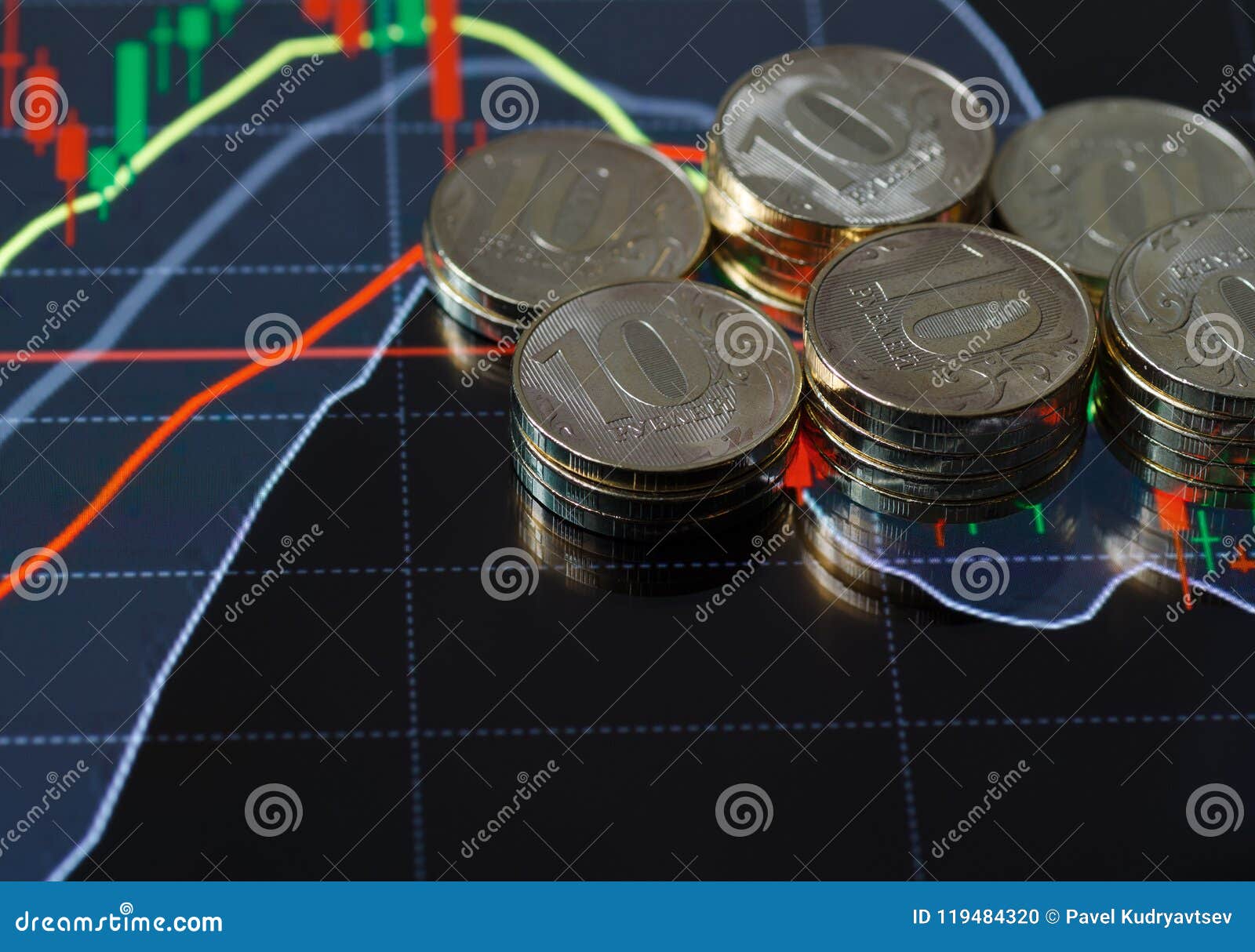 Digital Tablet Display with Graph and Stack of Coins. Stock Photo ...