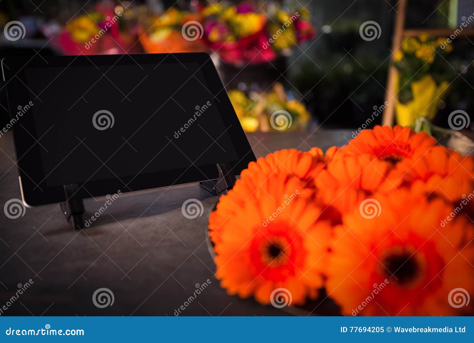 Digital Tablet at Flower Shop Stock Image - Image of indoors, bunch ...