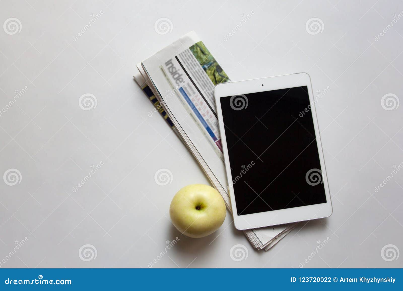 Digital Tablet, Folded Newspaper and Apple Stock Photo - Image of ...