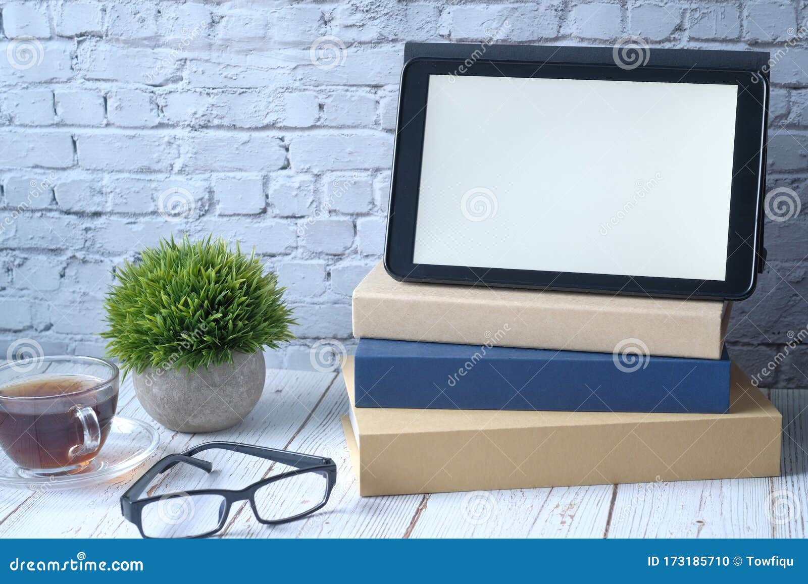 Digital Tablet and Stack of Book on Table Stock Photo - Image of ebook ...