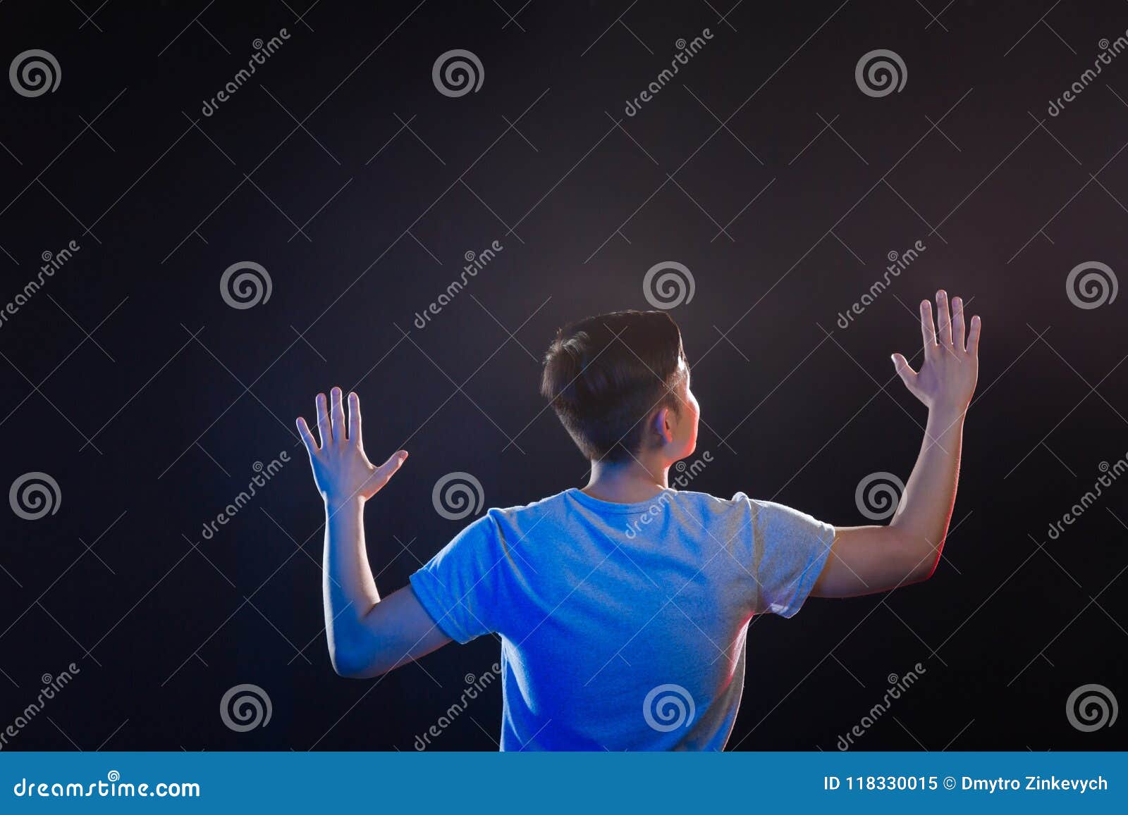 Nice Young Man Looking at His Hands Stock Image - Image of millennial ...