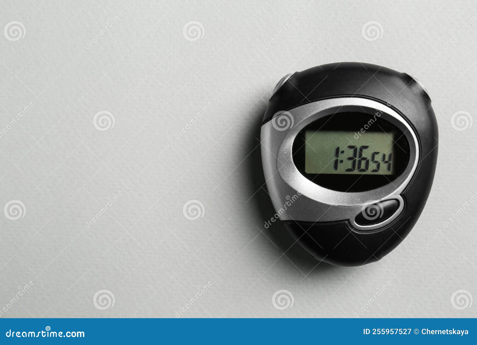 Digital Timer on Light Grey Background, Top View. Space for Text Stock ...