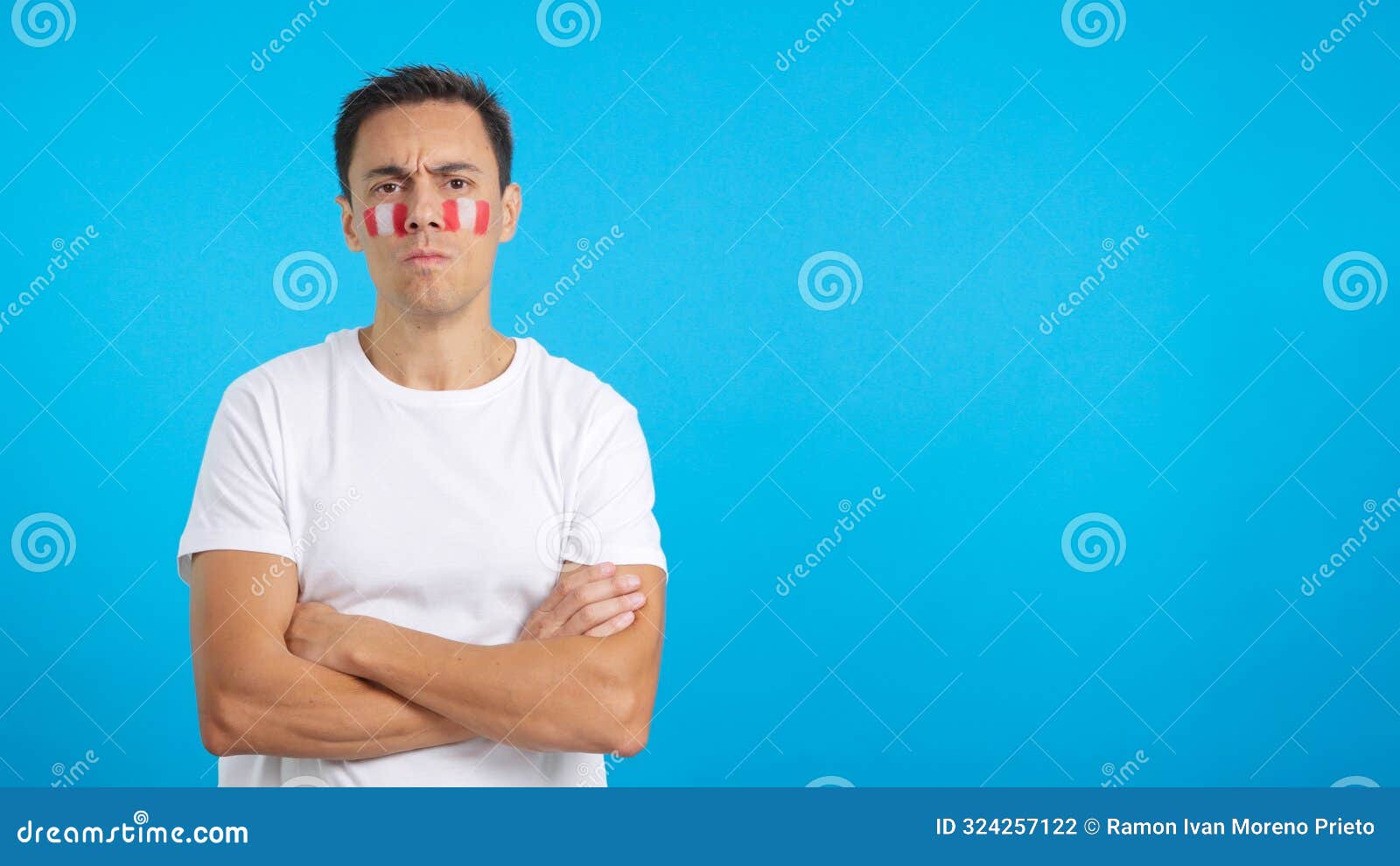 Dignified and Serious Man with Peruvian Flag Painted on Face Stock ...