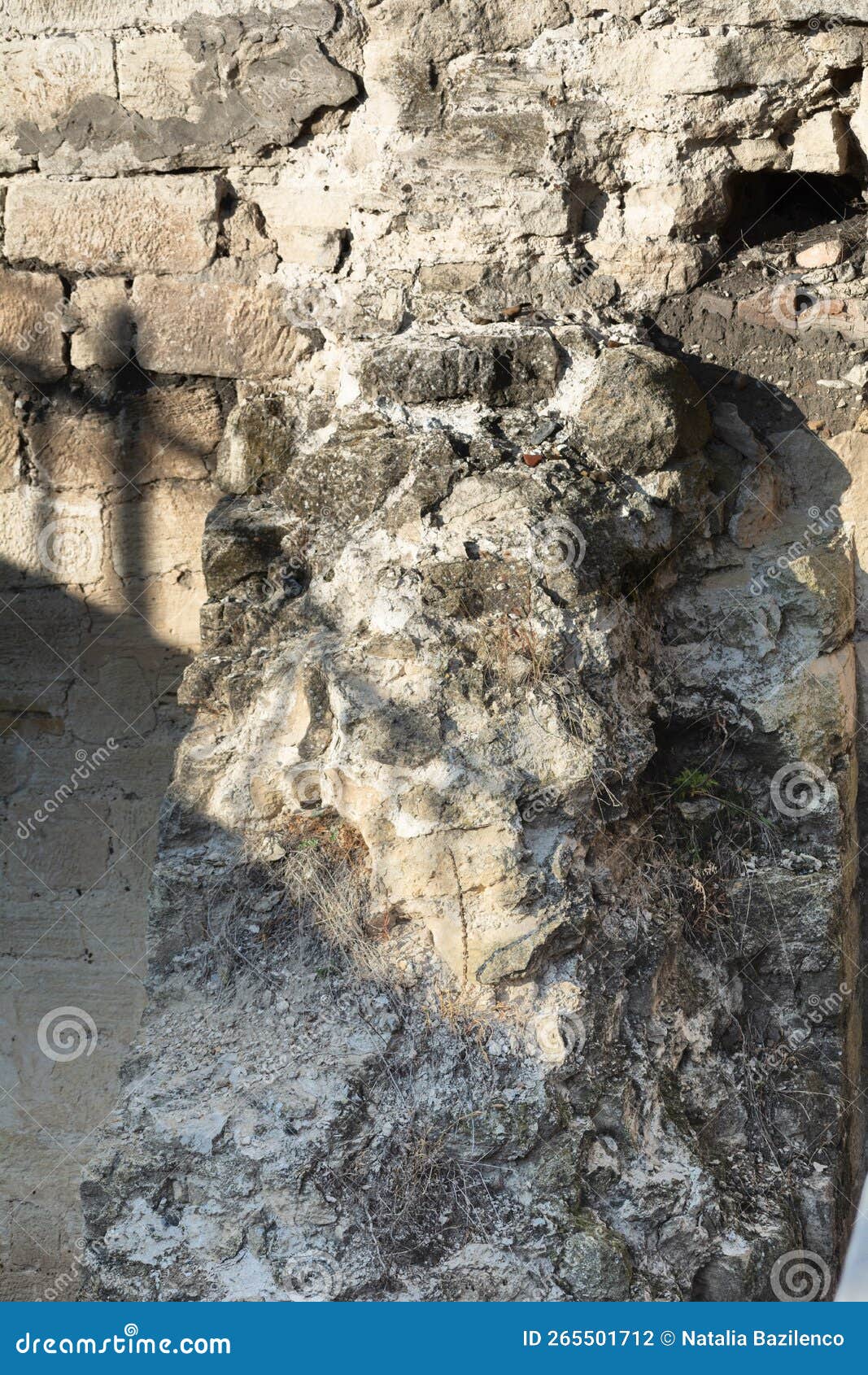The Dilapidated Ancient Buttress of the Fortress. View of the Base of ...