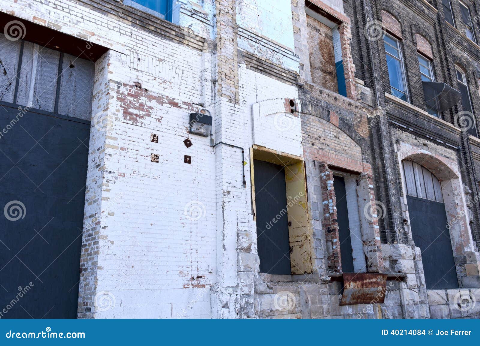 Dilapidated Dock Bays of Vacant Warehouse Stock Photo - Image of broken ...