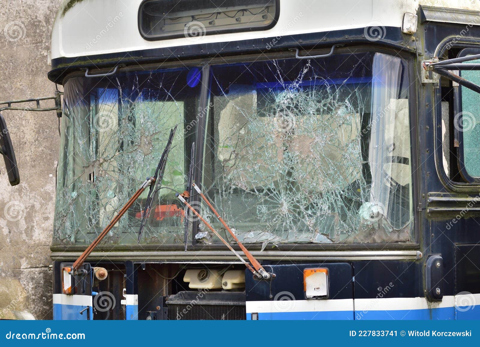 Dilapidated and Rusty Bus with Broken Windows in a Remote Area. Scrap ...