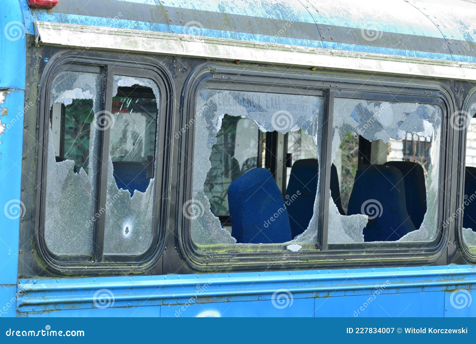 Dilapidated and Rusty Bus with Broken Windows in a Remote Area. Scrap ...