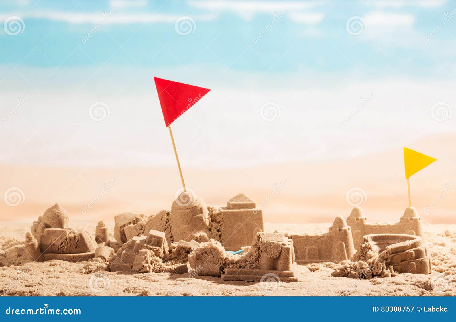 Castles And Coliseum With Flag, Rubber Duck In Sand. Royalty-Free Stock ...