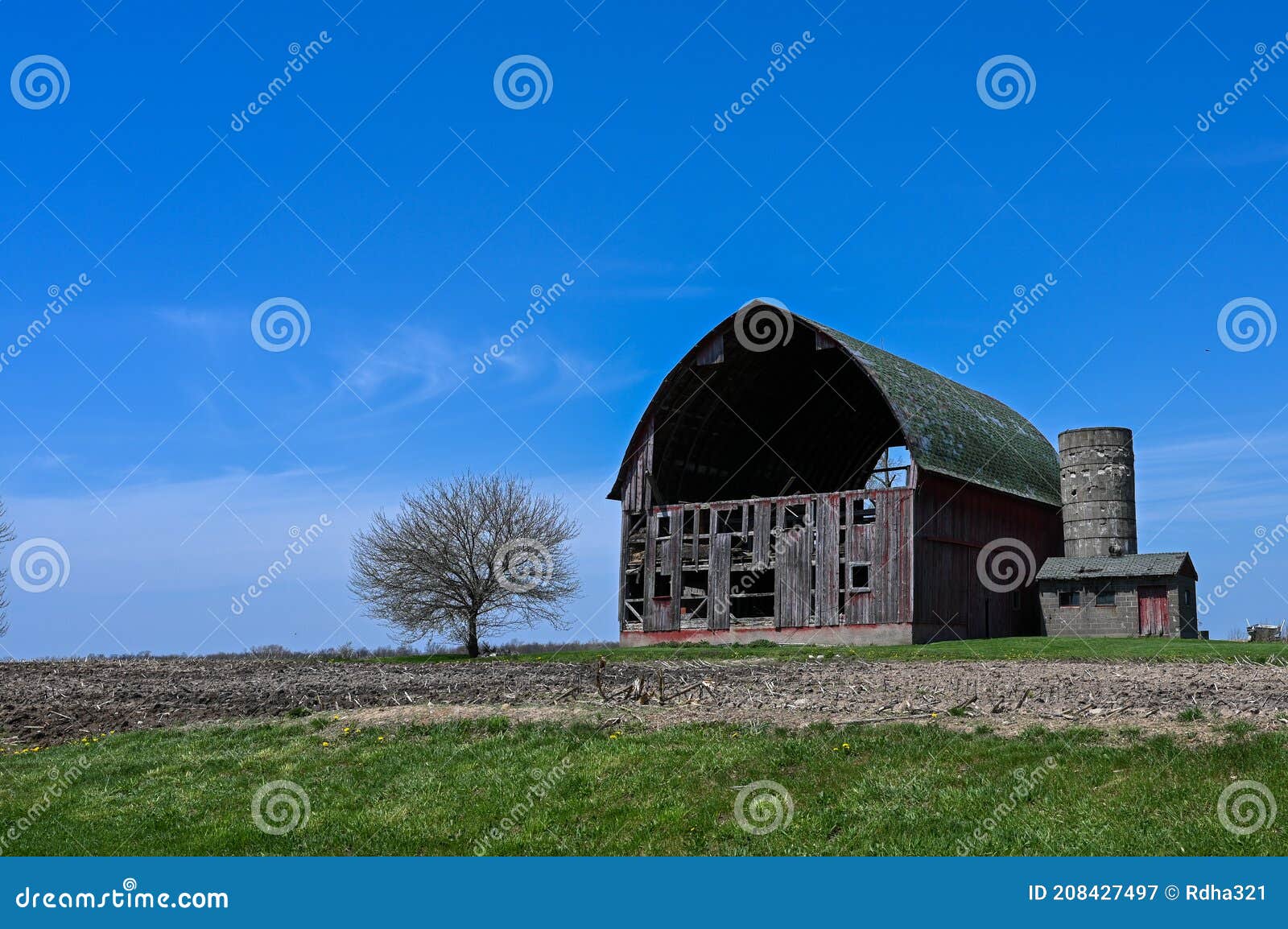A Dilapitated Barn in Springtime Stock Image - Image of weathered ...