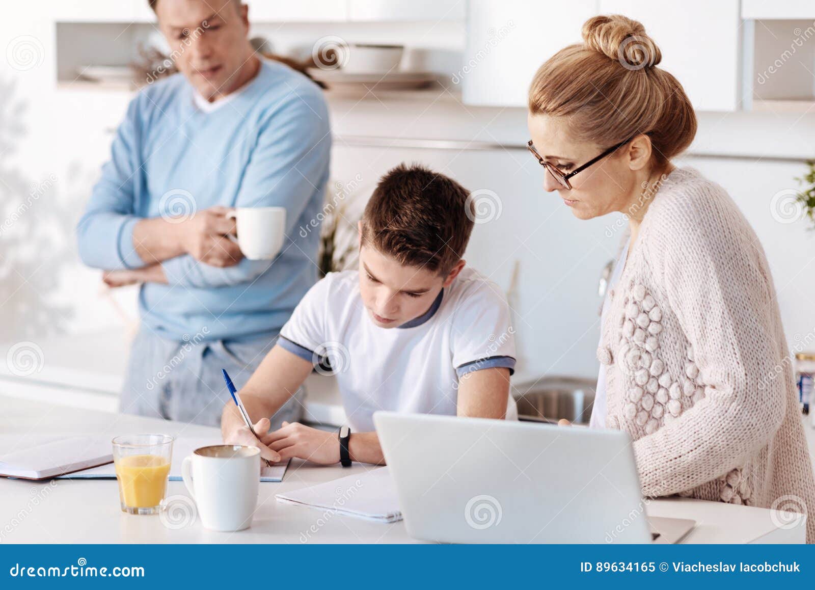 Diligent Boy Doing Homework with His Parents Stock Image - Image of ...