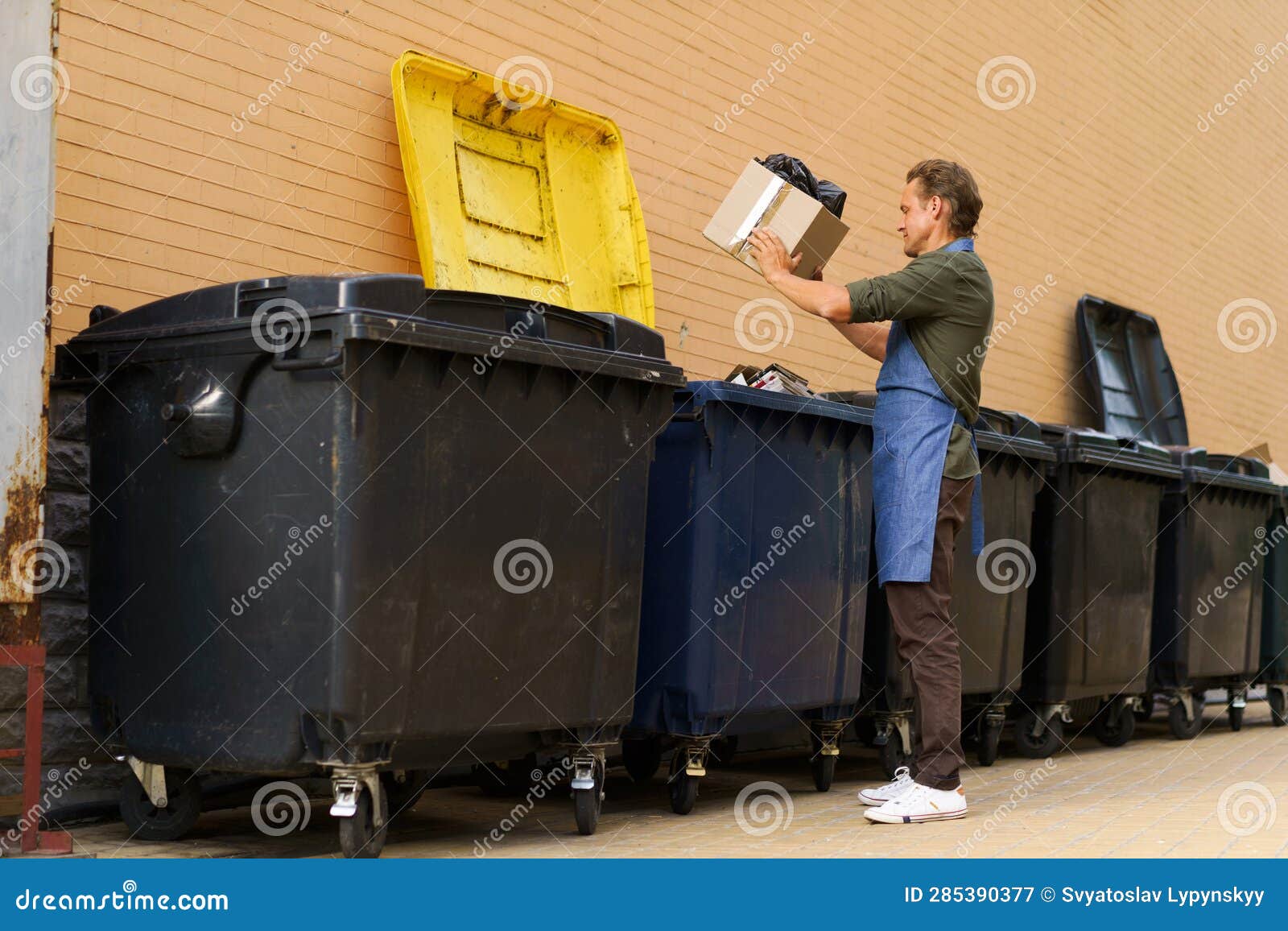 Diligent Kitchen Worker or Waiter is Seen Responsibly Disposing of ...