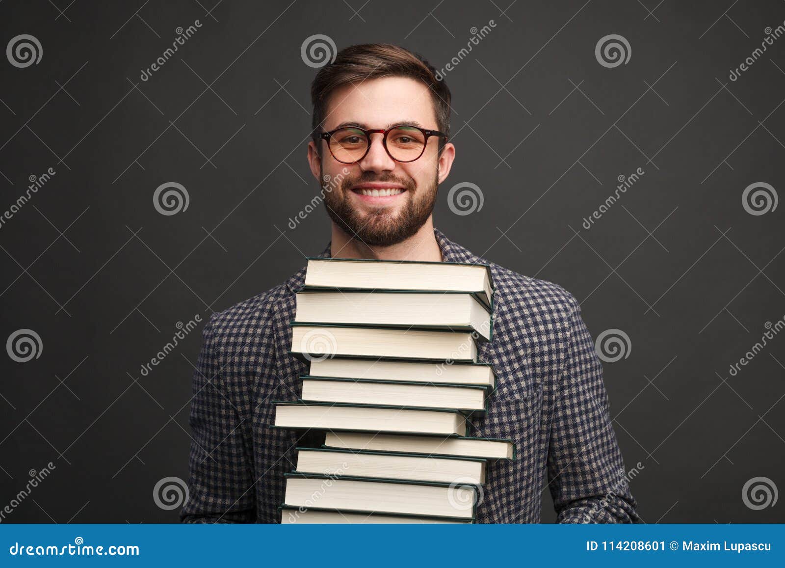 Diligent man with books stock image. Image of creative - 114208601