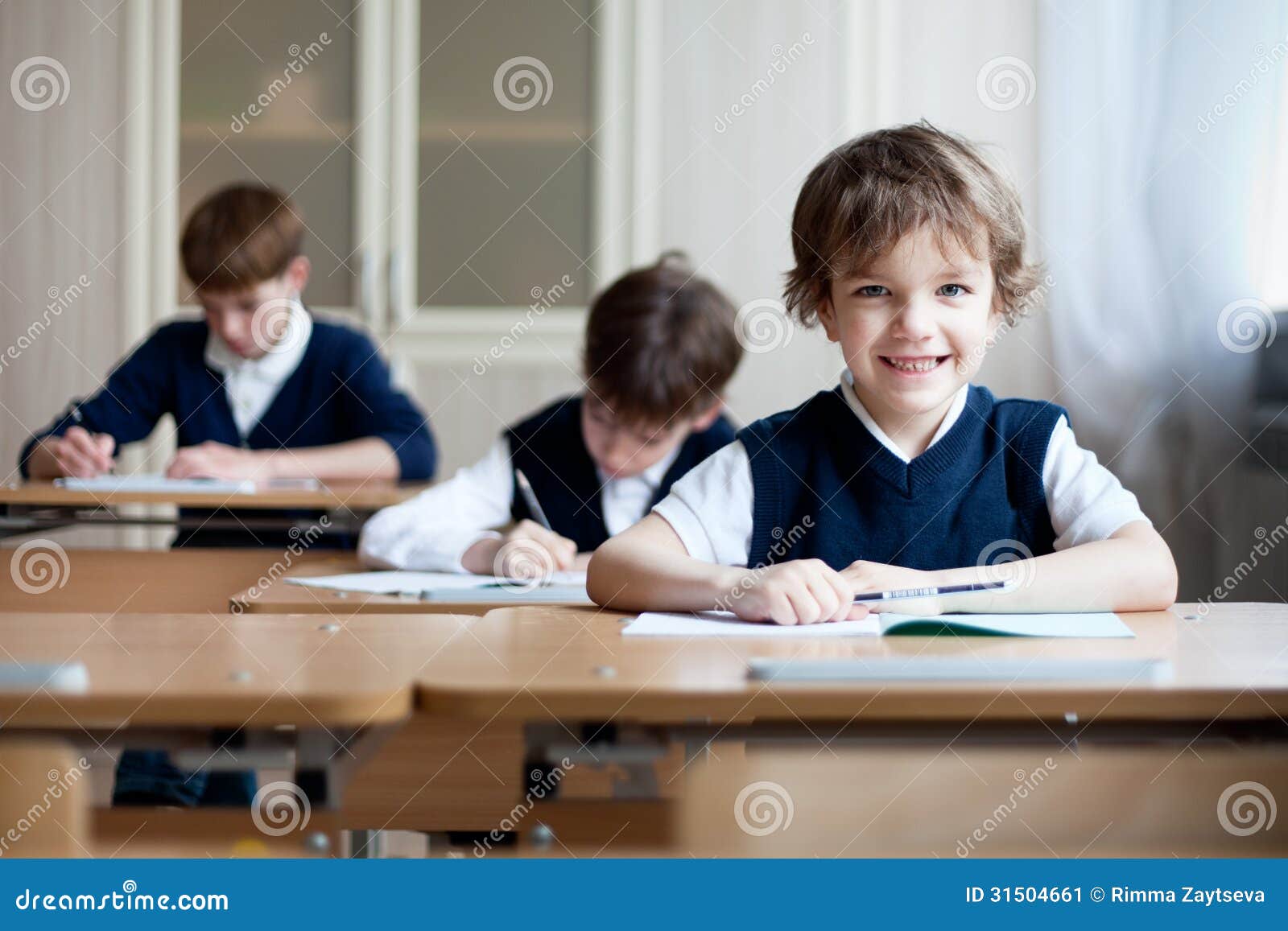 Diligent Student Sitting at Desk, Classroom Stock Image - Image of ...