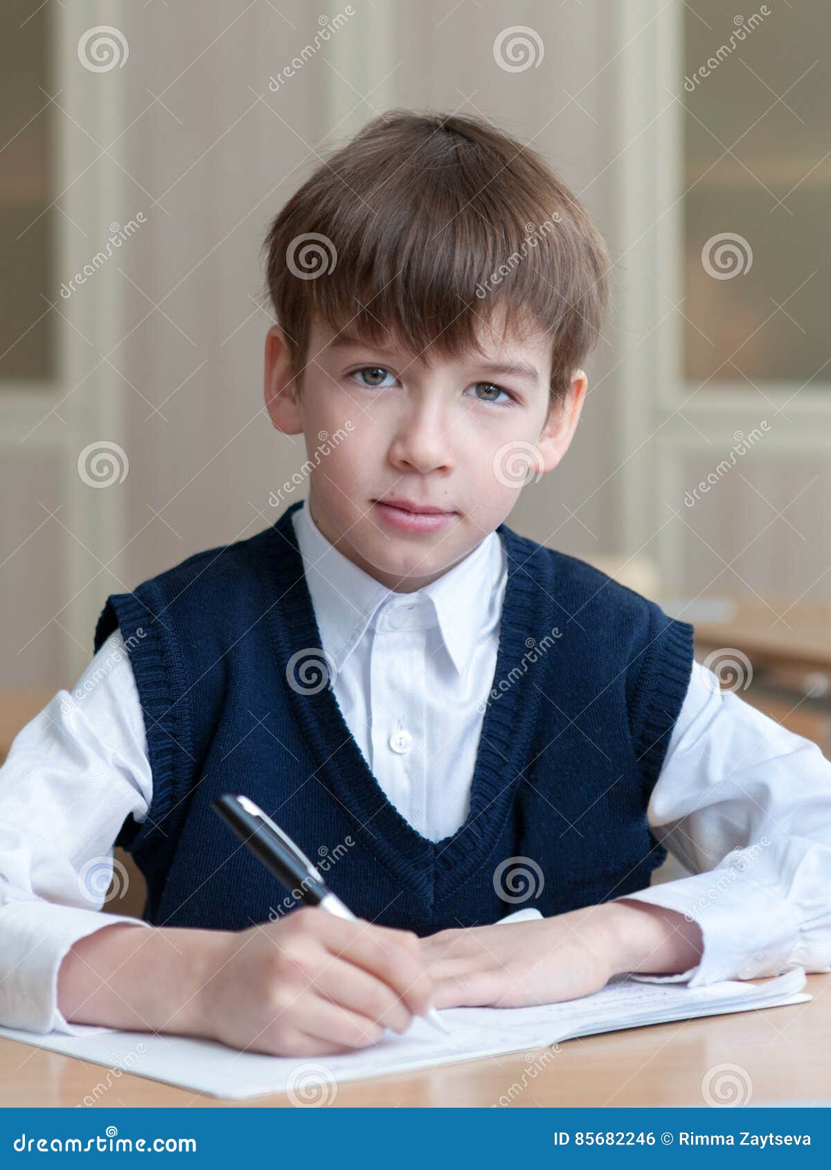 Diligent Student Sitting at Desk, Classroom Stock Photo - Image of male ...