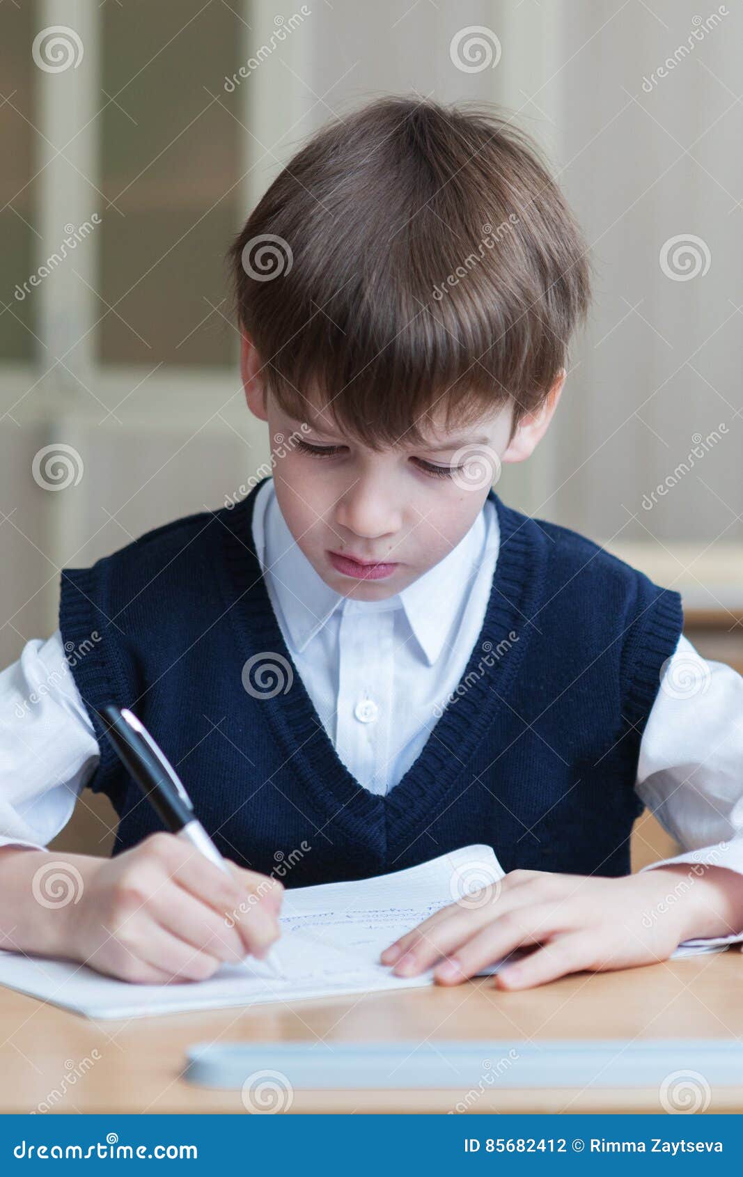 Diligent Student Sitting at Desk, Classroom Stock Photo - Image of ...