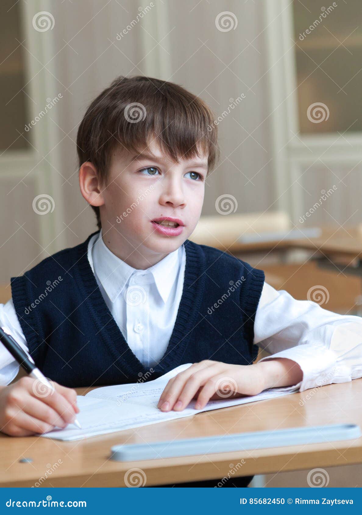 Diligent Student Sitting at Desk, Classroom Stock Photo - Image of ...