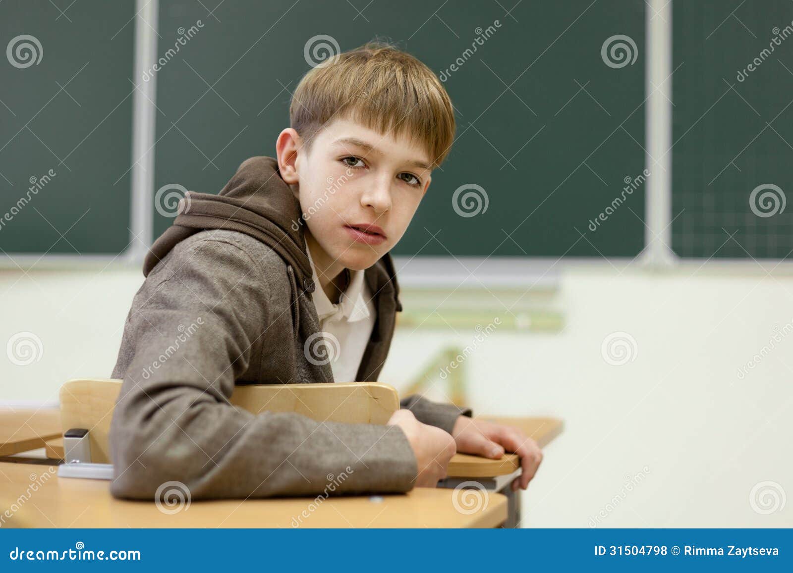 Diligent Student Sitting at Desk, Classroom Stock Photo - Image of male ...