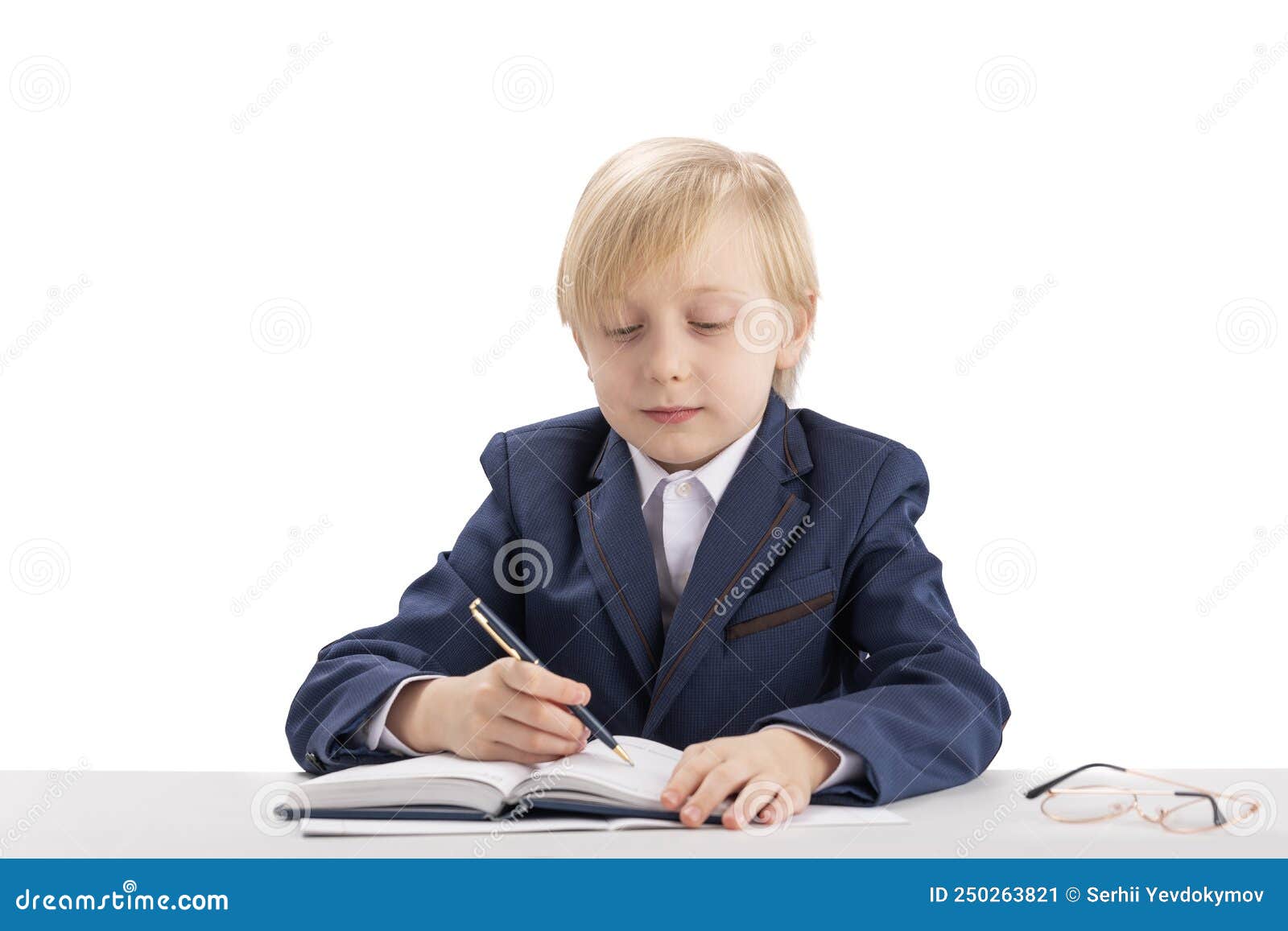 Diligent Student Writes in Copybook. Child Like Boss Sits at Table and ...
