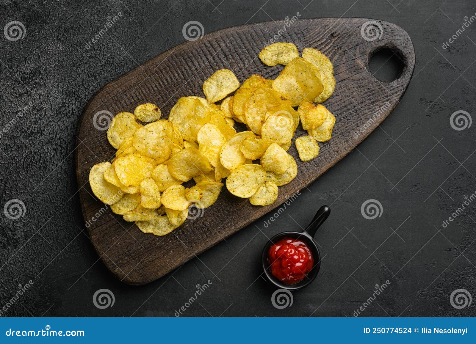 Dill Pickle Flavored Potato Chips on Black Dark Stone Table Background ...