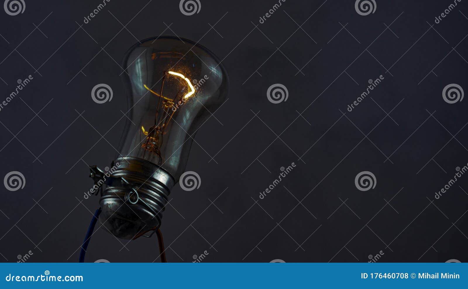 A Dim Light Bulb in the Dark Stock Photo - Image of room, equipment ...