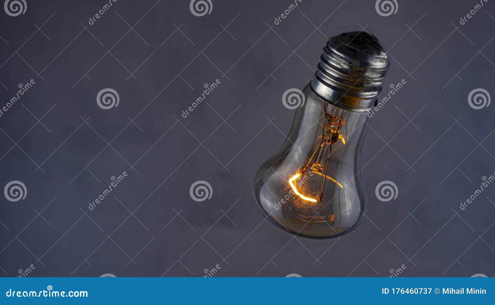 A Dim Light Bulb in the Dark Stock Image - Image of lights, retro ...