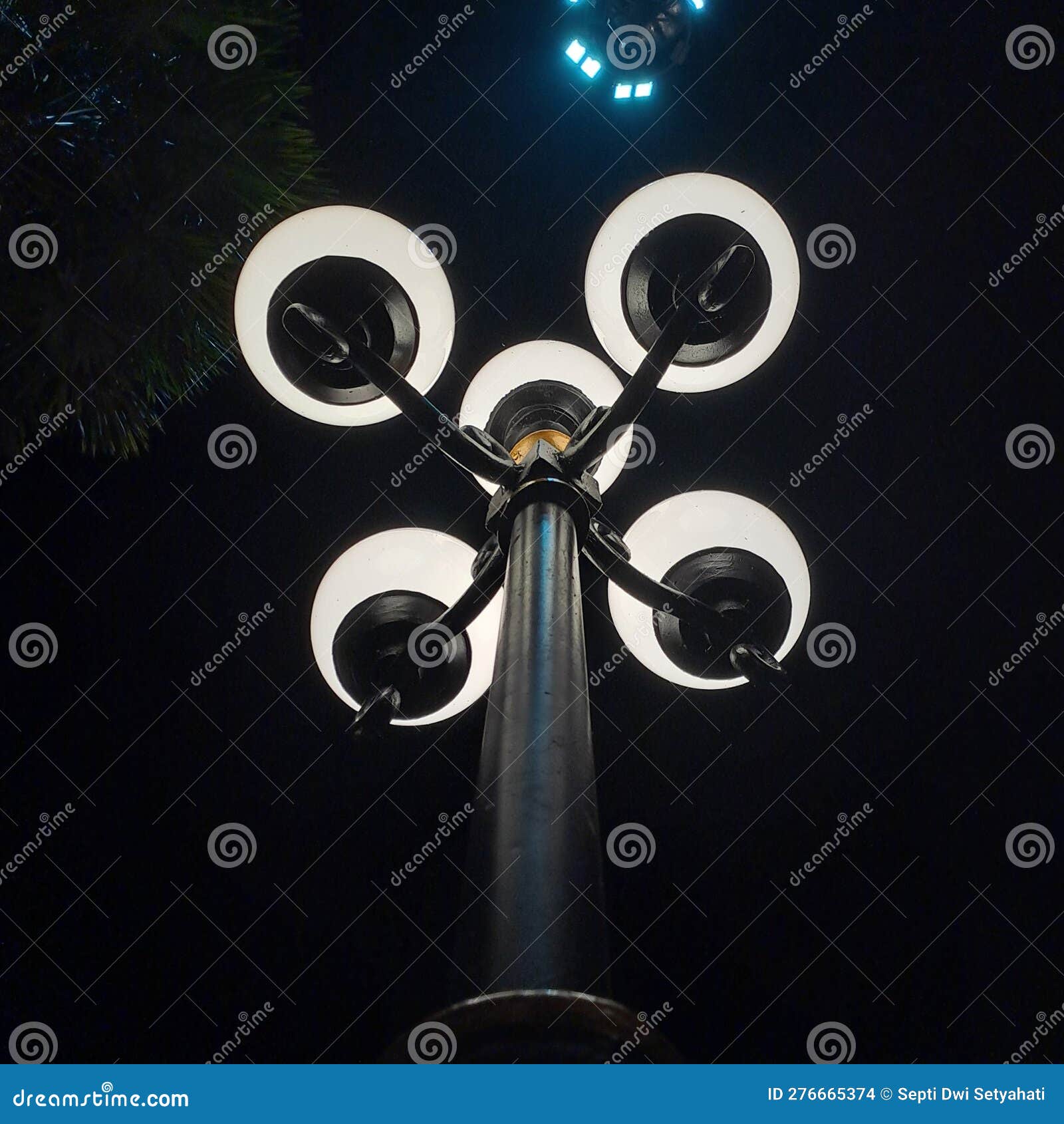 Dim street lights stock photo. Image of night, street - 276665374