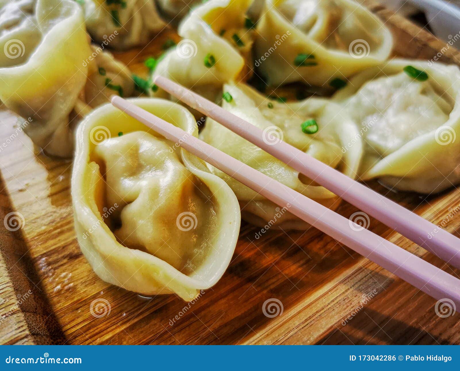 Dim Sum Aka Dumplings, Momos with Chopsticks Stock Photo - Image of ...