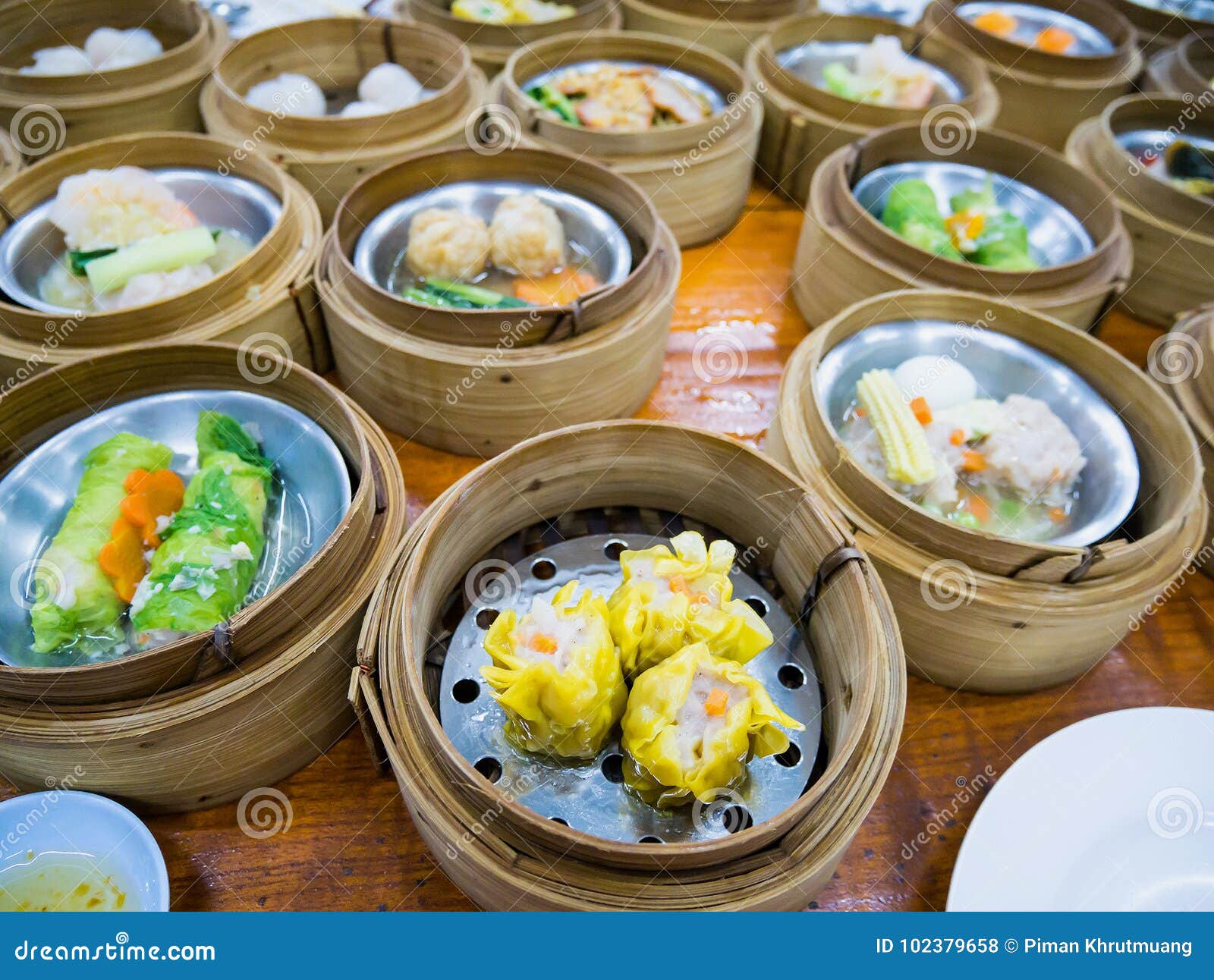 Dim sum in bamboo steamer stock photo. Image of dining - 102379658