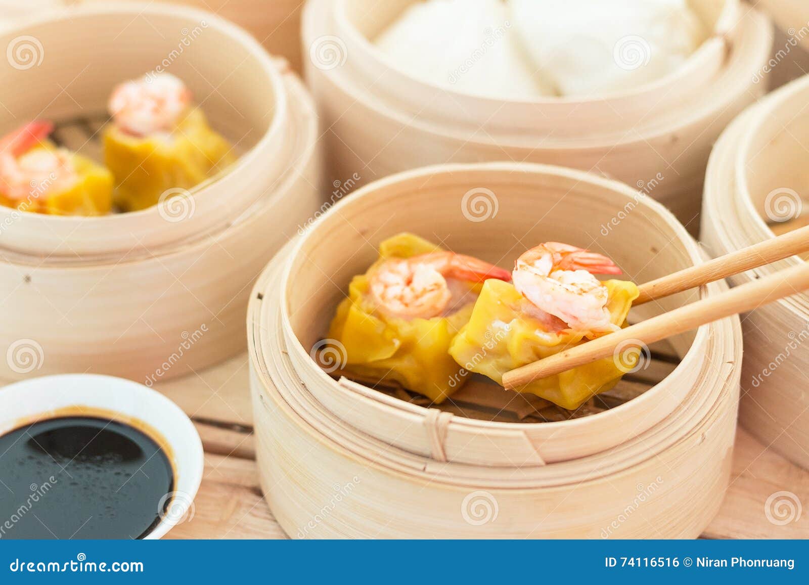 Dim Sum in Bamboo Trays stock photo. Image of plate, asia - 74116516