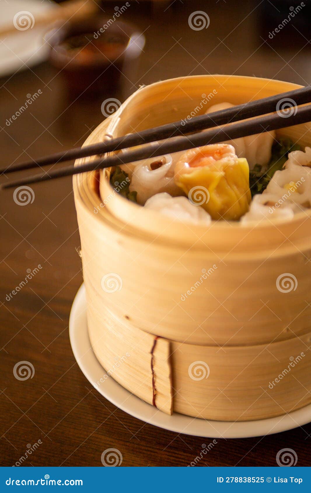 Dim sum in a basket stock image. Image of asian, steamed - 278838525