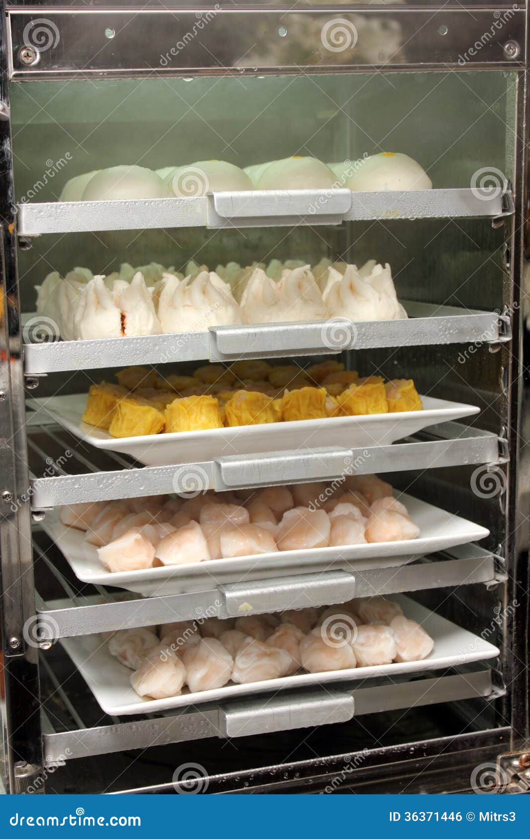 An Dim Sum Dishes Cooked in Steamers Stock Photo - Image of shrimp ...