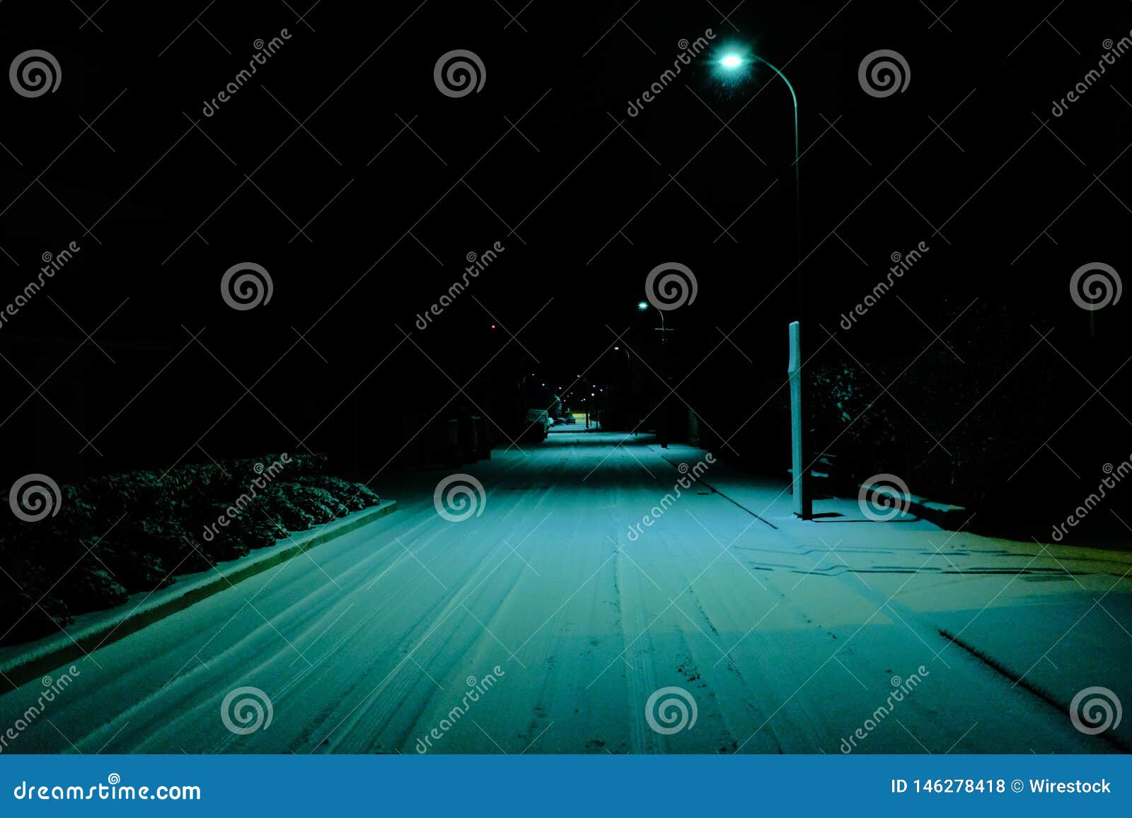 A Dimly Lit Road with a Street Lamp Stock Photo - Image of path, power ...