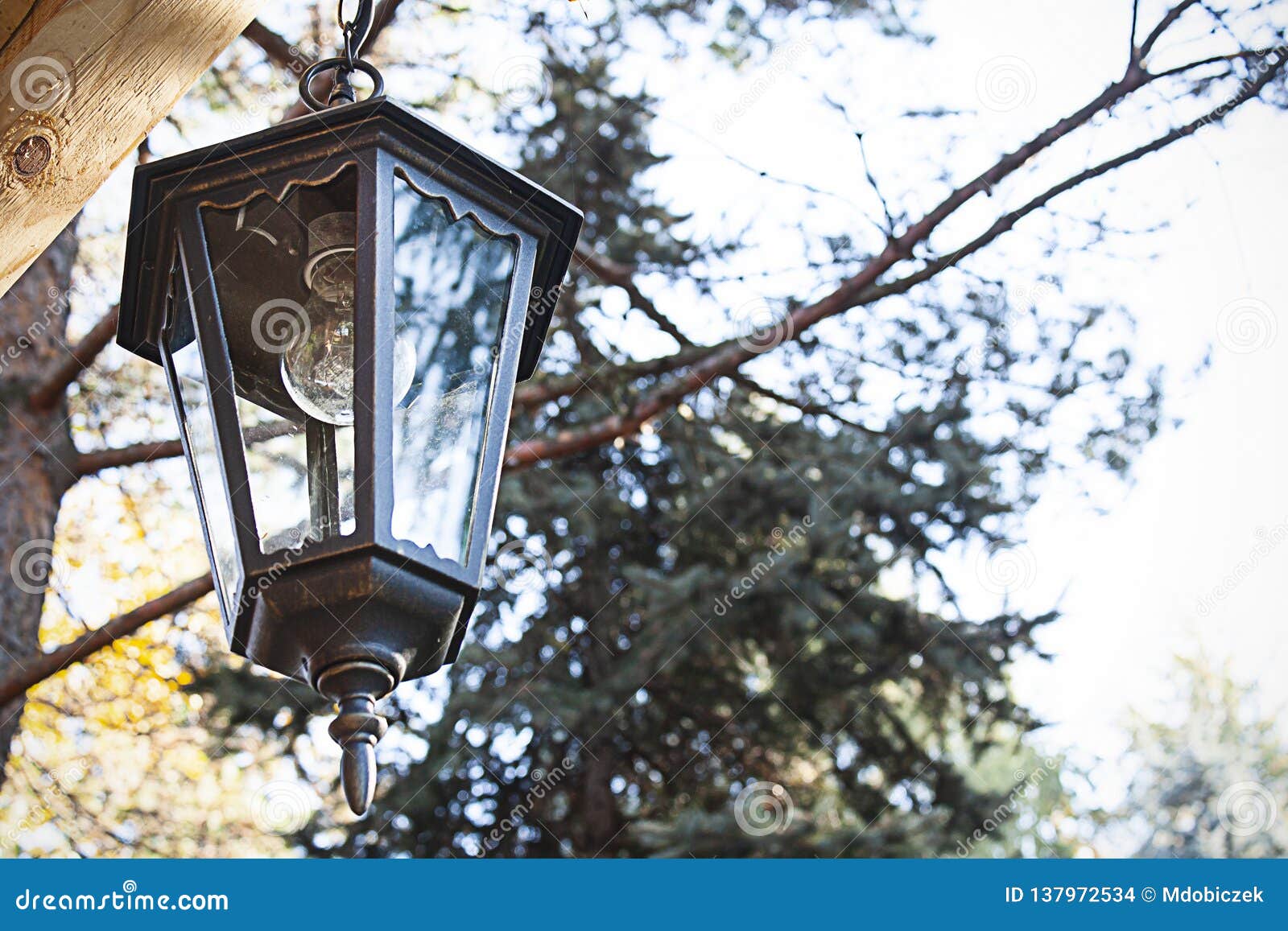 Dimmed roadside lantern stock photo. Image of electric - 137972534