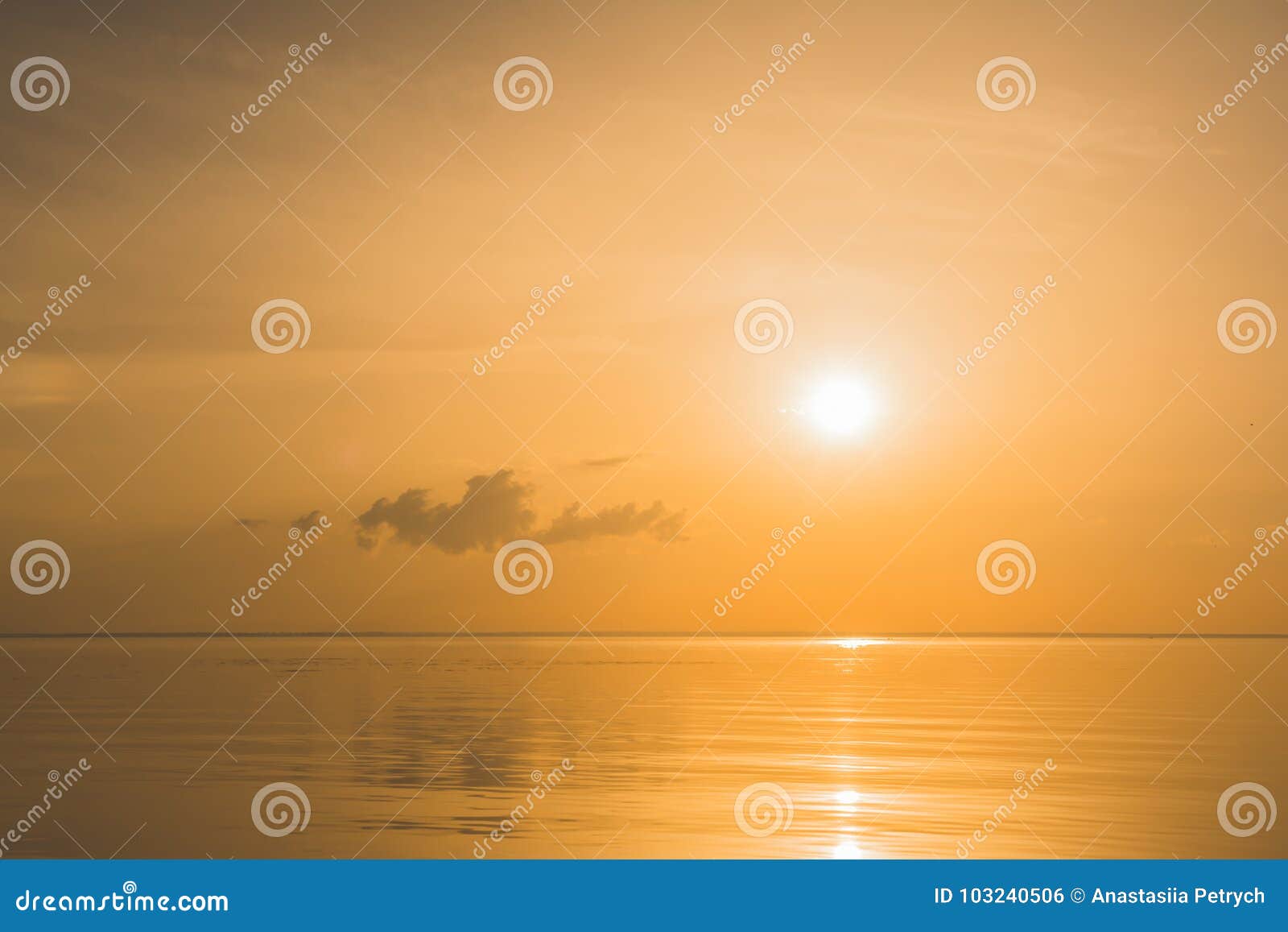 Dimmed Soft Sunset on the Ocean with Small Clouds Stock Photo - Image ...