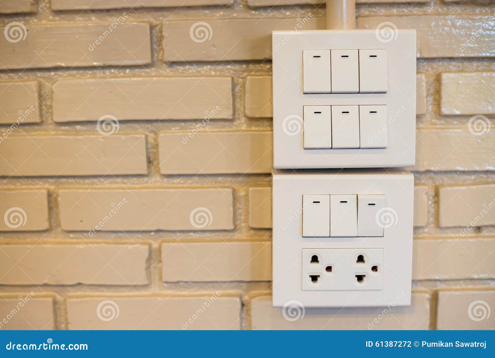 Dimmer Switch and Light Switch on Switchboard.over Brick Wall Stock ...