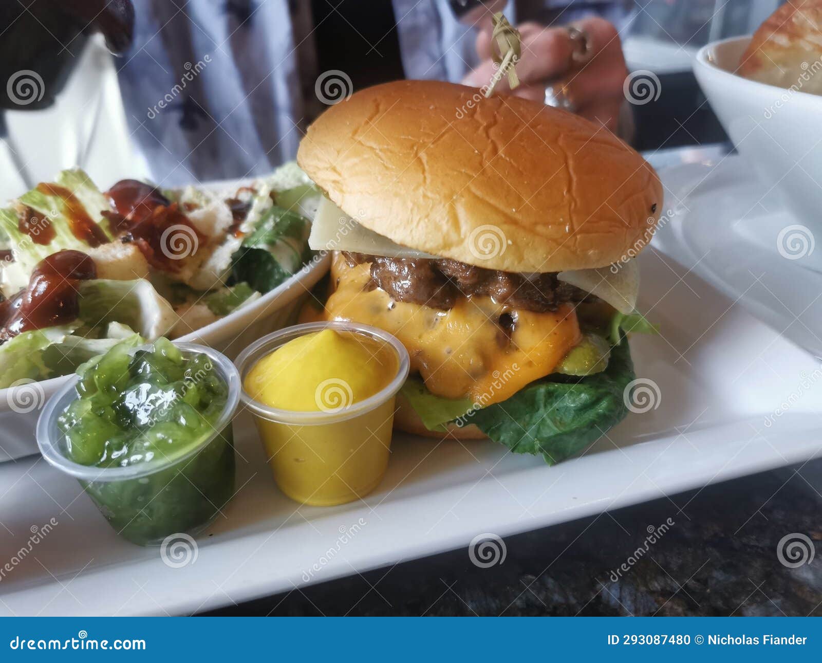 Diner Cheeseburger with Mustard and Relish Stock Photo - Image of dish ...