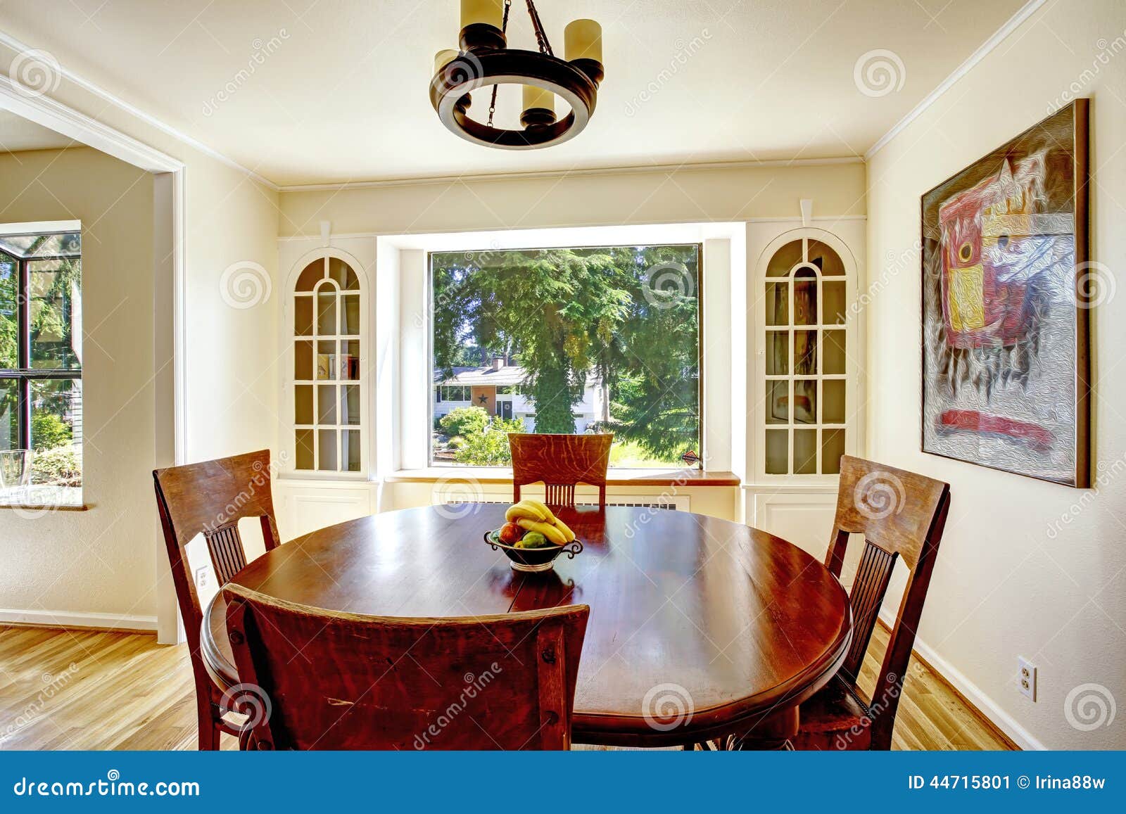 Dining Area with Round Wooden Table Stock Image - Image of inside ...