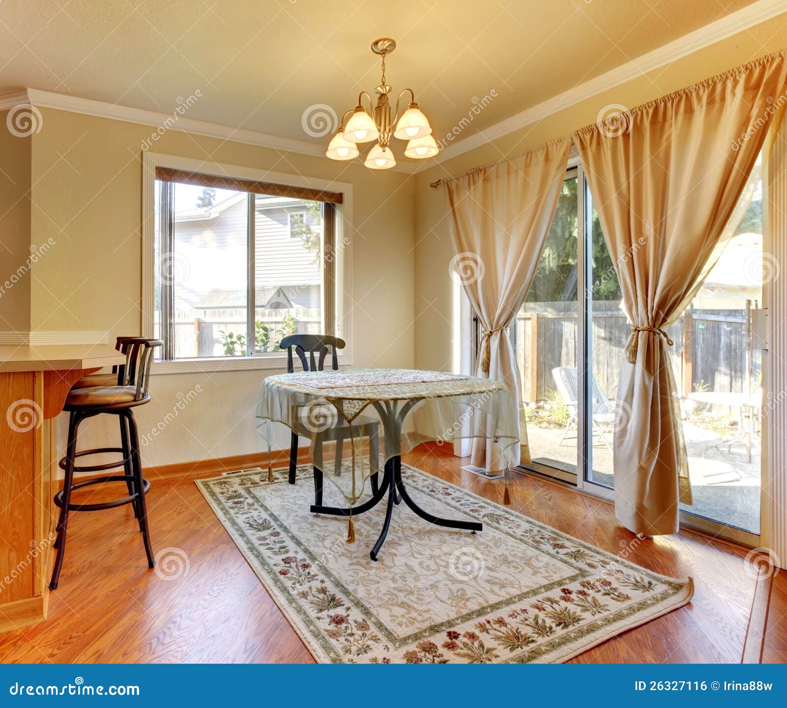 Dining Room Area with Doors and Window and Simple Round Table. Stock ...