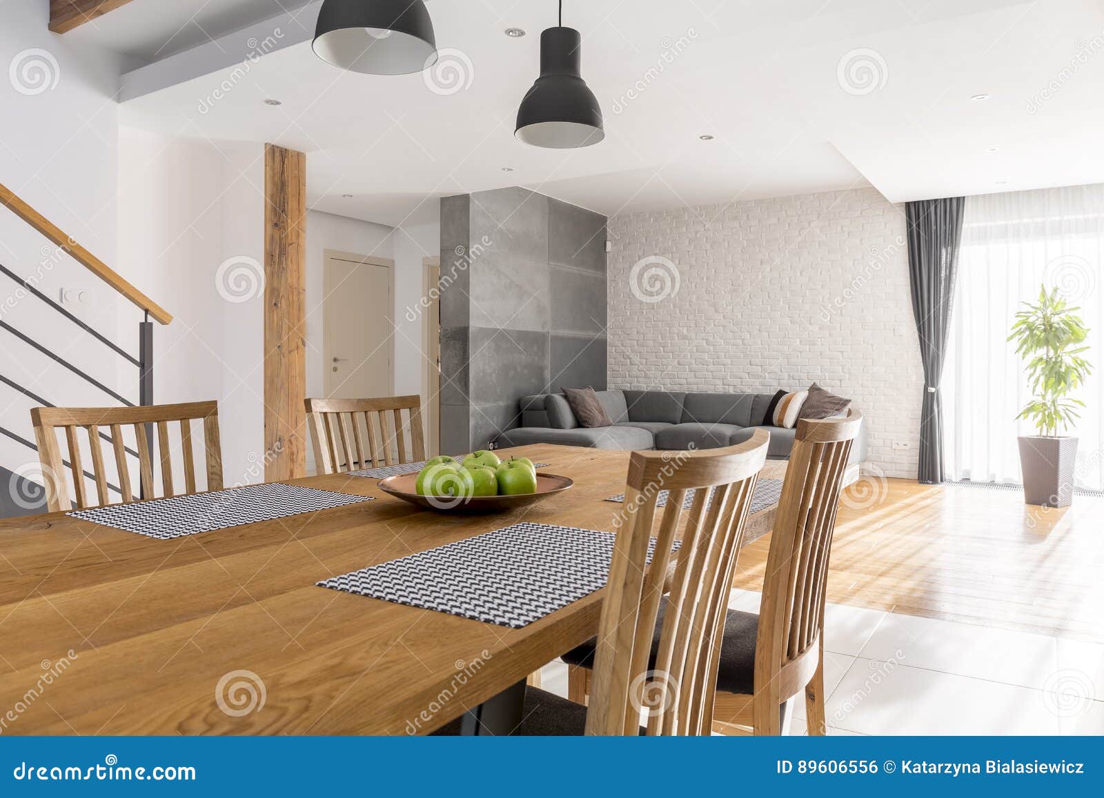 Dining Room with Communal Table Stock Photo - Image of house, brick ...