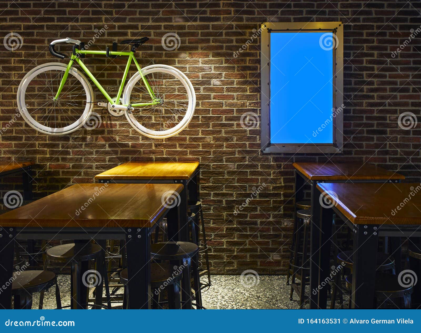 Dining Room of an Industrial Style Restaurant with a Blank Display and ...