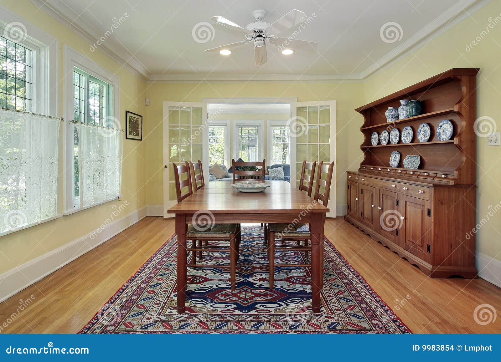 Dining Room in Suburban Home Stock Photo - Image of house, chandelier ...