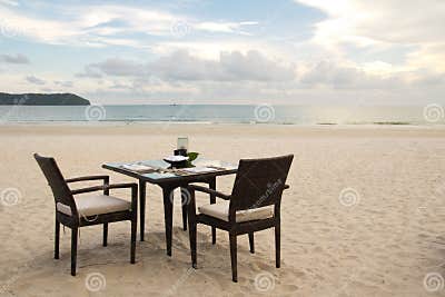Dining table on beach stock image. Image of elegant, couples - 26008143