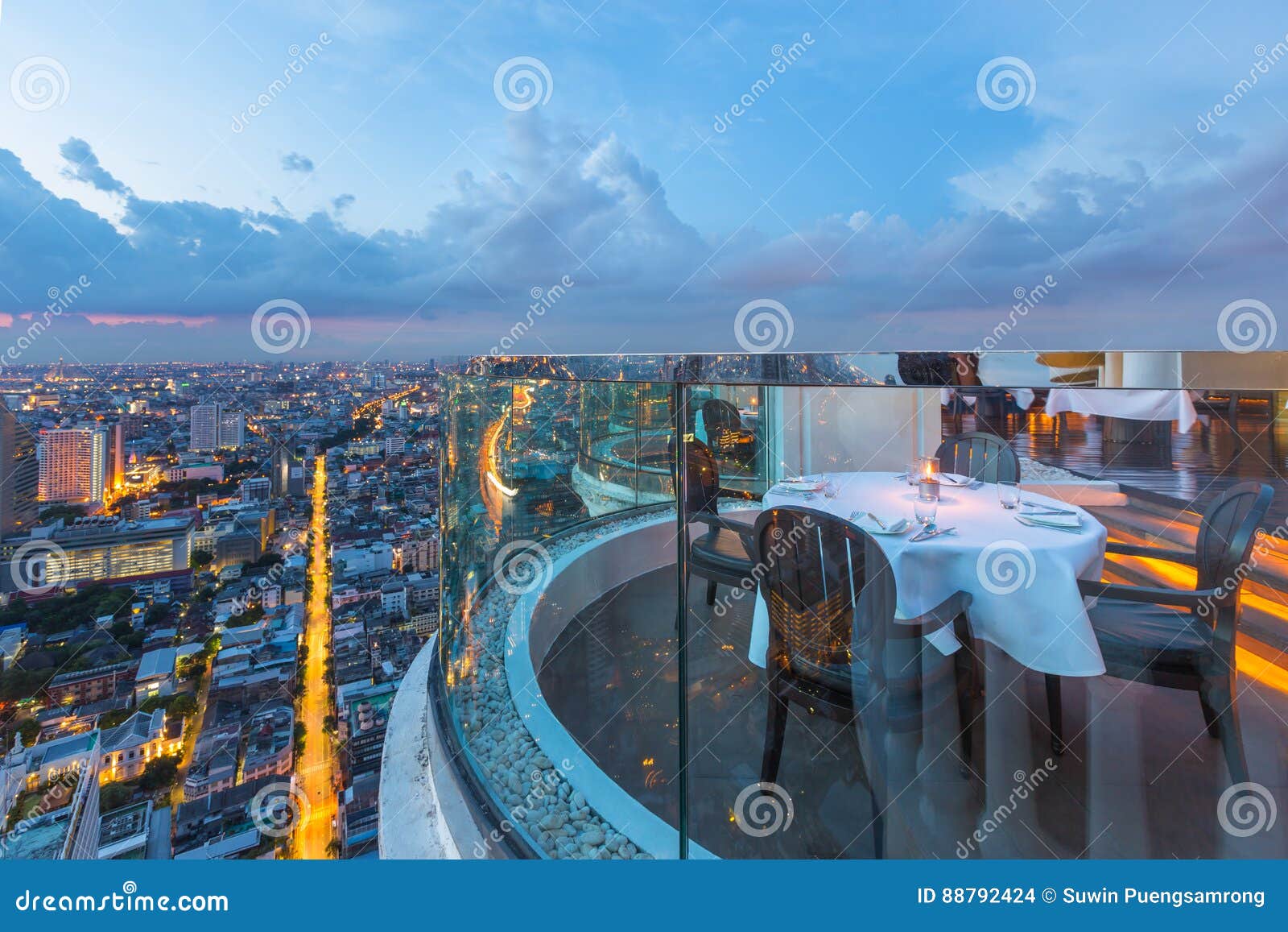 Dining Table with Beautiful City View at Twilight Scene Stock Photo ...