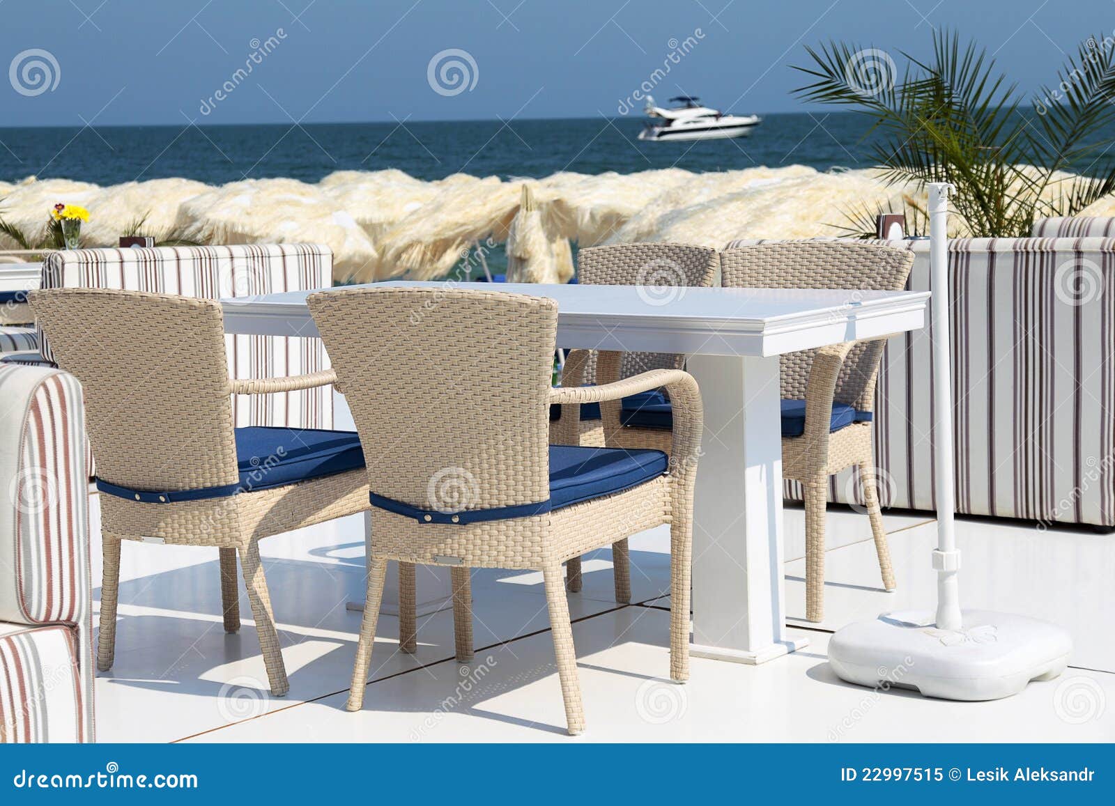 Dining Table and Chairs on the Beach Stock Image - Image of dining ...