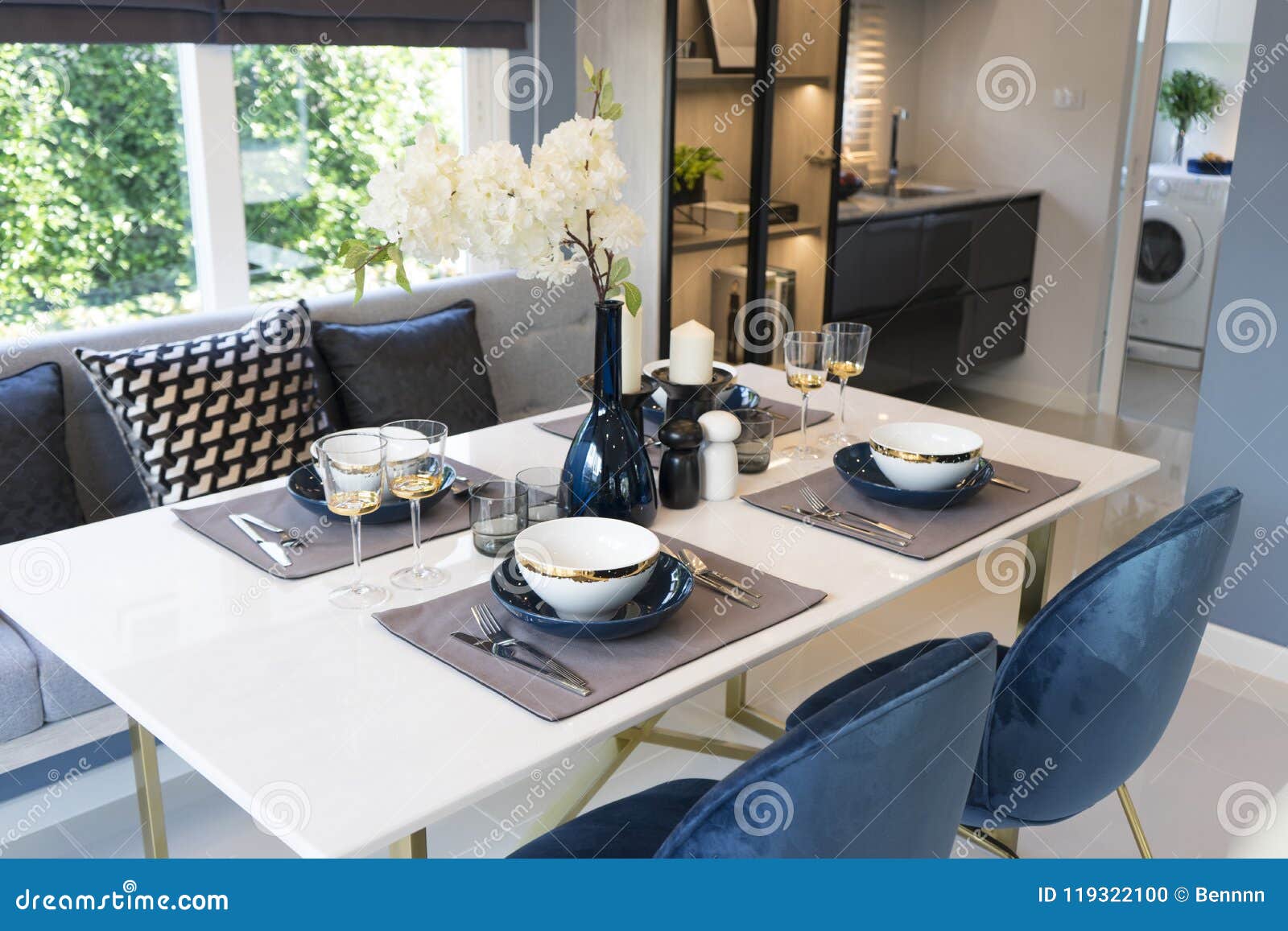 Dining Table and Comfortable Chairs in Modern Home Stock Photo - Image ...