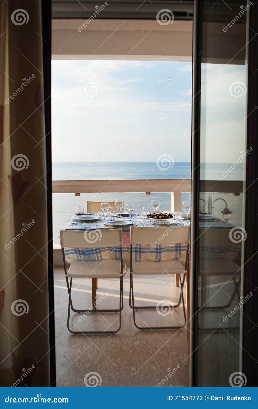 Dining Table Set on a Balcony Overlooking the Sea Stock Photo - Image ...