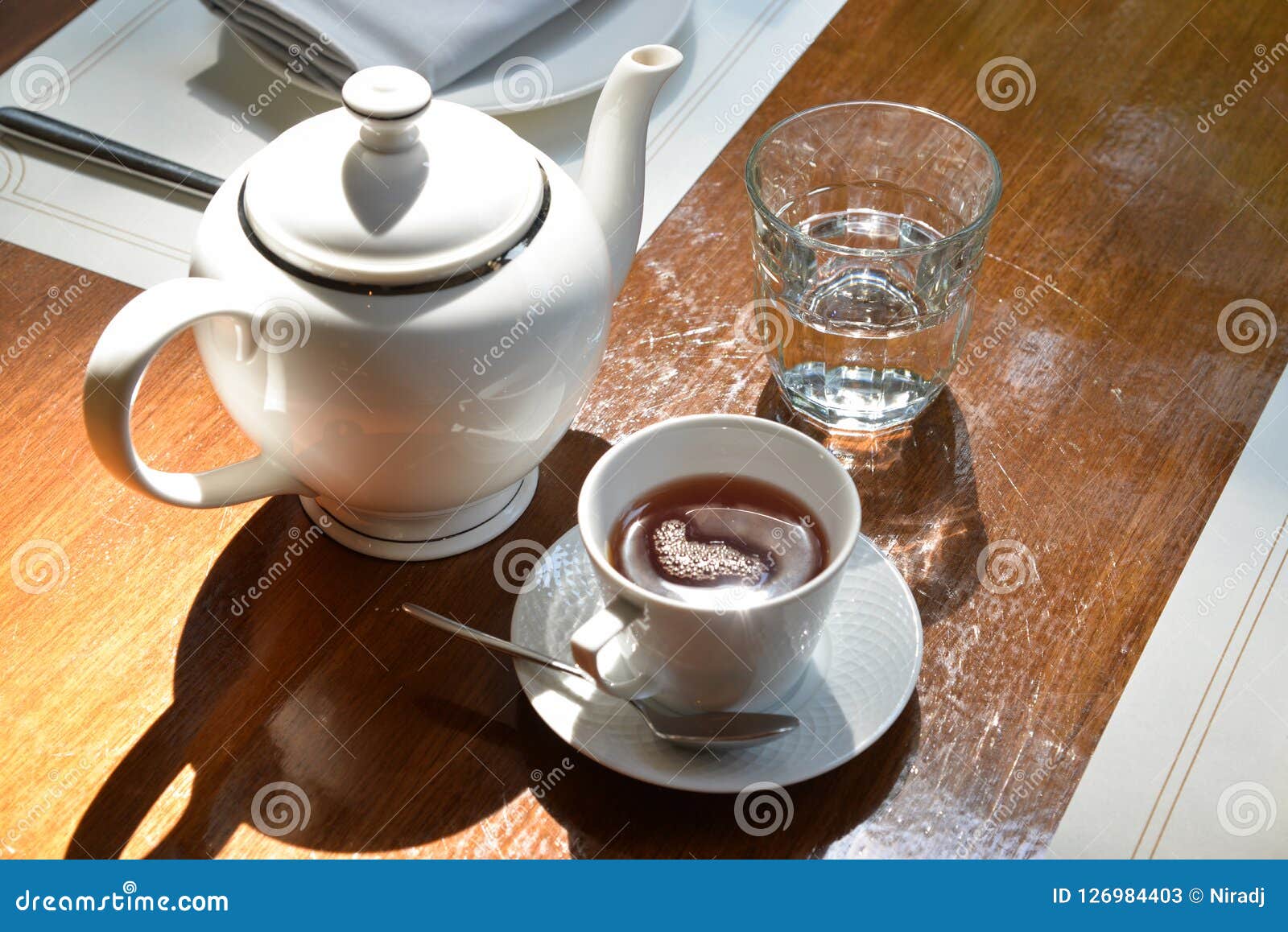 Dining Table with Tea and Teapot Stock Image - Image of drink, table ...