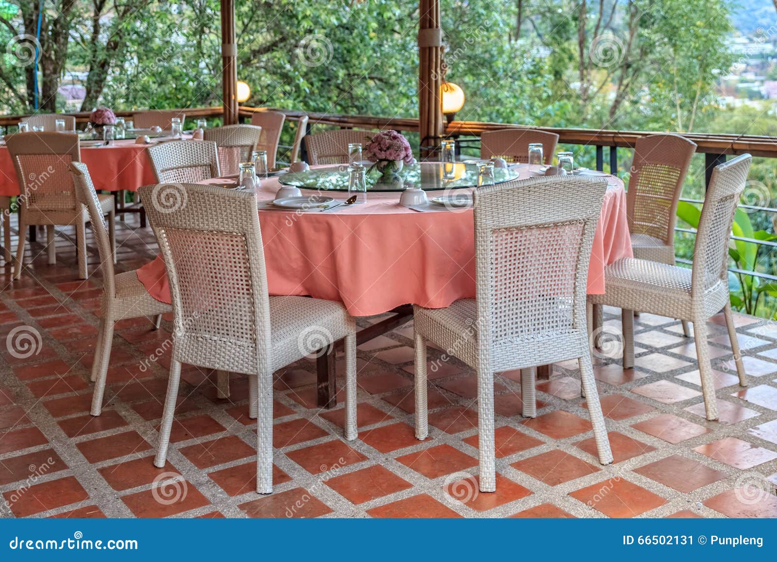 Dining Table on terrace stock image. Image of chairs - 66502131